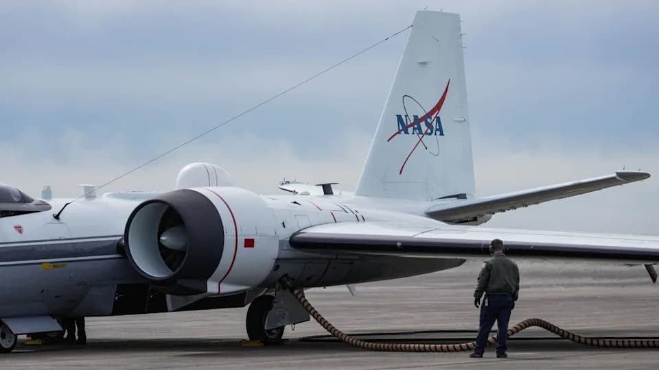 50-Year-Old NASA WB-57 Research Jet Belly-Lands at Ellington Field ...